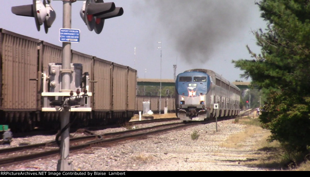Amtrak 391 races CN C744